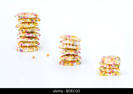 White chocolate buttons with coloured sprinkles or hundreds and ...