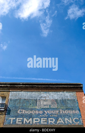 faded wall hoarding for the defunct temperance building society, in ...