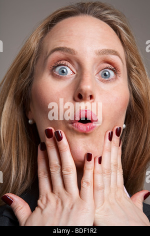 Portrait of surprised woman Stock Photo - Alamy