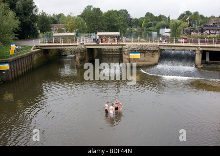 children playing sluice weir flood defence river Stock Photo - Alamy