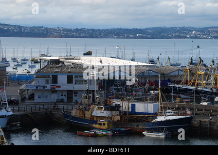 The fish market building at Brixham Harbour Devon England UK Stock ...