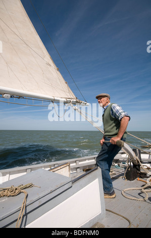 Bill Coleman retired whitstable oyster fisherman at the helm of his ...