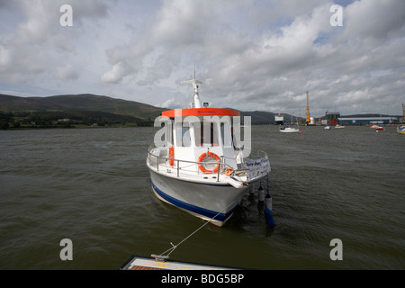A small passenger ferry boat crossing Thames near Tilbury docks Stock ...