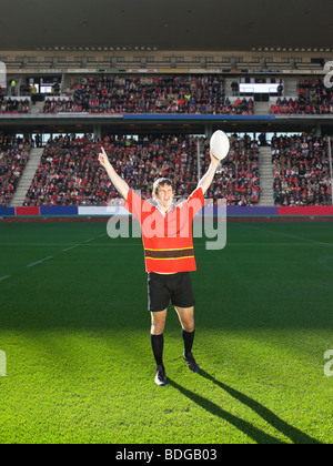 Rugby player celebrating Stock Photo - Alamy
