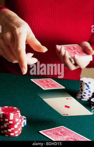 Woman dealing cards at casino Stock Photo - Alamy