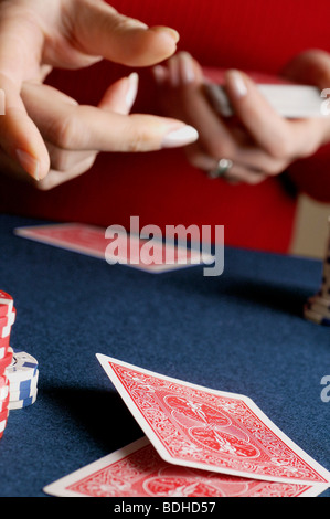 Woman dealing cards at casino Stock Photo - Alamy