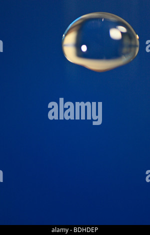 Water drops falling from tap Stock Photo - Alamy