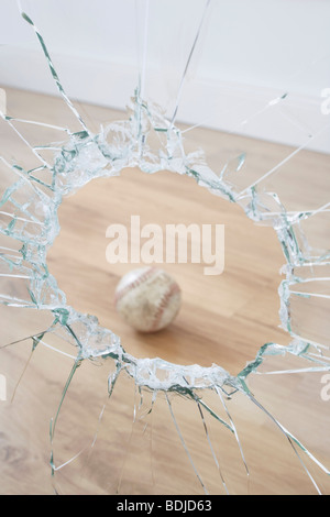 Broken glass in the window of a wooden hut Stock Photo - Alamy