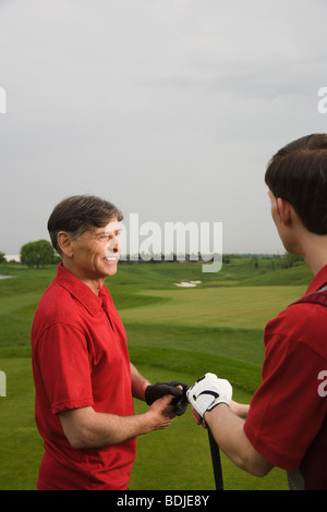 Adult father and young son discuss and solve family problems Stock ...