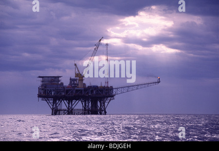 Australia. Industry. Bass Strait. Offshore oil platform at sunrise ...