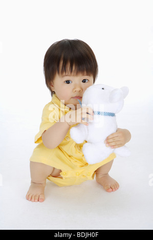 A vertical shot of a cute chinese girl with bob hairstyle in ...