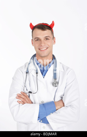 Devil doctor in funny medical concept isolated on white background ...