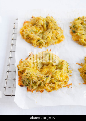Homemade Swiss potato rosti or Rösti in a large frying pan on an ...