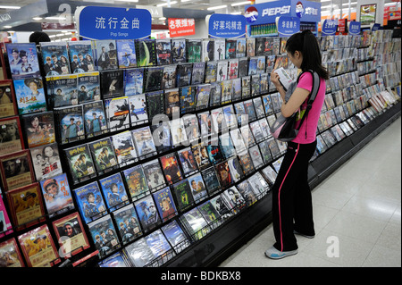 DVD are on sale in a Wal-Mart supercenter in Beijing, China. 2009 Stock ...
