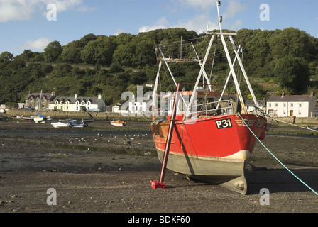 The Old Harbour of Fishguard with Fishing boats by the old quay and a ...