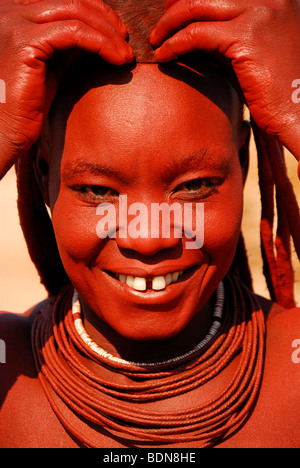 Himba woman with traditional body painting in Namibia Stock Photo - Alamy