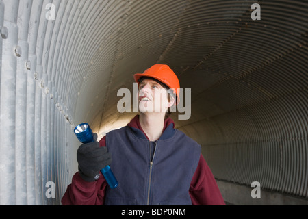 inspector or engineer is inspecting construction and quality assurance ...