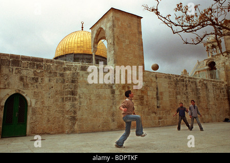 Children play football at the Mosque of Al-Hakim, Cairo, Egypt Stock ...
