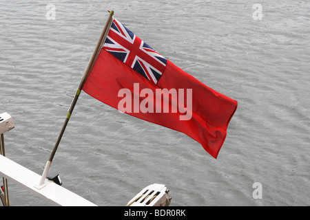 The Red Ensign of the British Merchant Navy flies from the stern of the ...