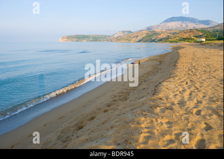 View over the blue flag Mounda beach in early evening light on the ...