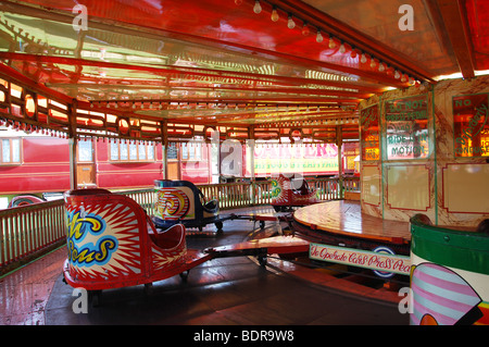 Old fashioned fairground swings ride, deserted Stock Photo - Alamy