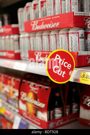 Cheap alcohol for sale in a supermarket window Stock Photo - Alamy