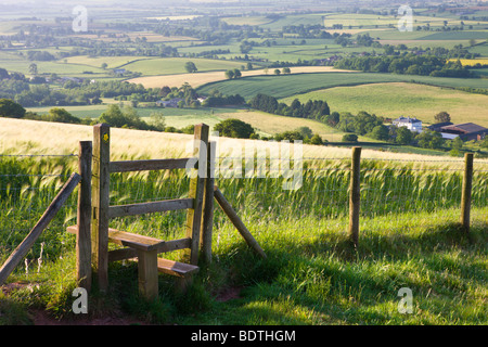Footpath and stile through fields, Raddon Hill, Mid Devon, England ...