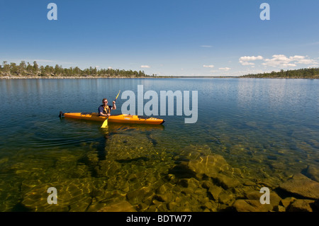 kayak touring at lake in nature reserve rogen, sweden Stock Photo - Alamy