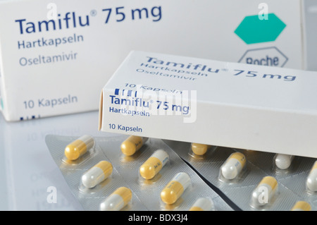 Tamiflu medicine box with blister and capsules closeup with lots of ...