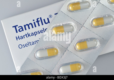 Tamiflu medicine box with blister and capsules closeup with lots of ...