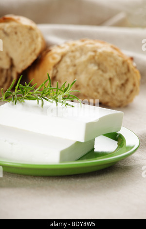 Greek traditional Feta soft cheese in the plate Stock Photo - Alamy