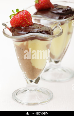 Pudding Dessert with Chocolate Sauce and fresh Berries on wooden ...