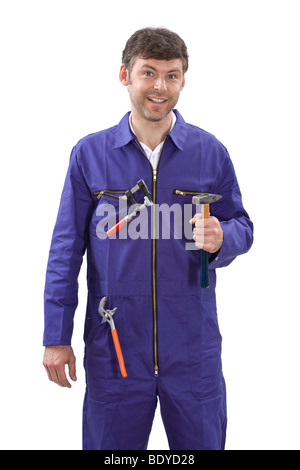 Workman with tool wearing a boiler suit Stock Photo - Alamy