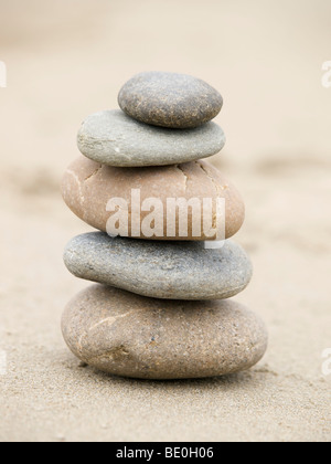 A closeup of stacked stones in beach Stock Photo - Alamy