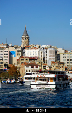 View from the Galata bridge, Galata Koepruesue on a small boat and port ...