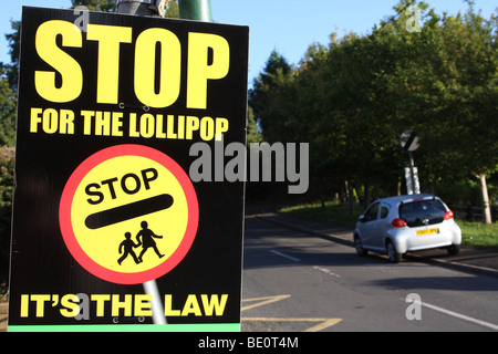 School patrol crossing warning sign and lights Stock Photo - Alamy