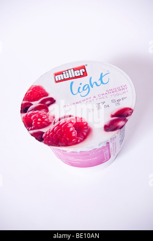 Muller raspberry and cranberry fat free yogurt dessert 99kcal Stock ...