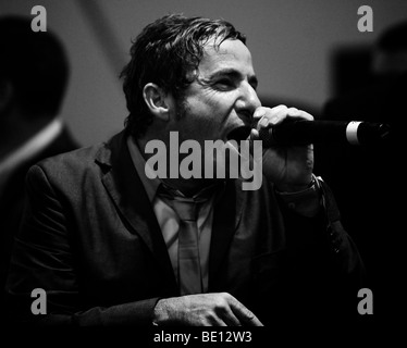 Barry Ashworth, lead singer of the Dub Pistols performing at The Glade ...