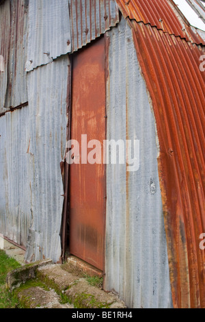 Rusty corrugated sheets forming part of derelict shed Stock Photo - Alamy