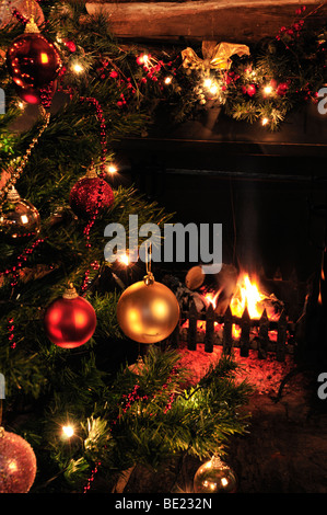 A roaring fire in a traditional English pub at Christmas, the Red Lyon ...