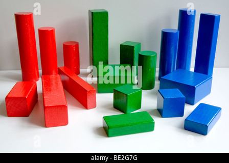 A variety of coloured wooden 3D shapes Stock Photo - Alamy