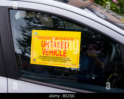 Untaxed Vehicle warning sticker Stock Photo - Alamy