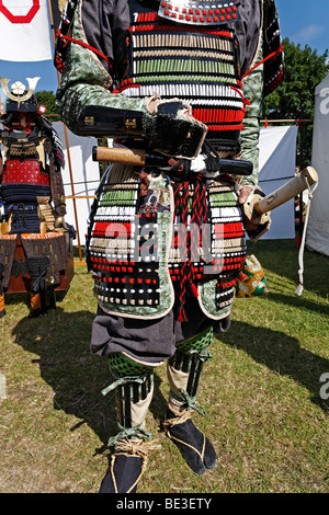 16th century Japanese samurai armour. Showing helmet and full tunic ...