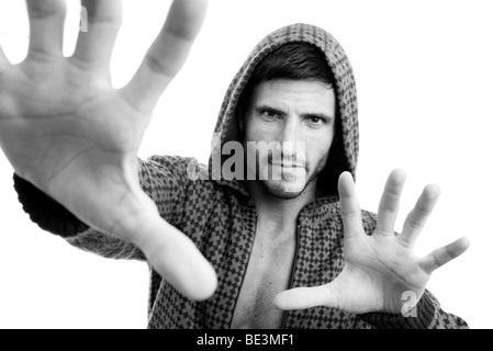 man wearing black hoodie hiding eyes Stock Photo - Alamy