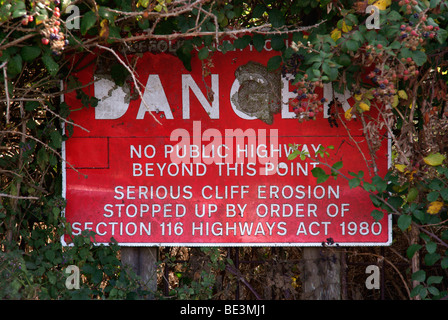 Warning sign "Cliff Collapse Road Closed" risk of falling Stock Photo ...