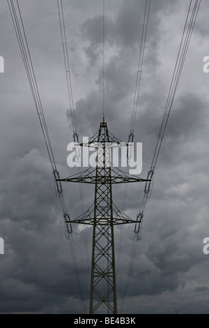 Power poles transmission line against a stormy sky, copy space Stock ...