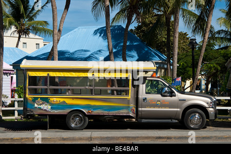 Colourful local truck type buses on the Caribbean island of Tortola ...