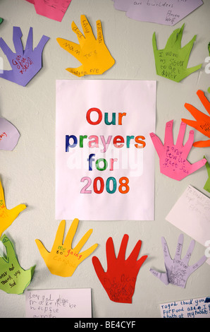 CHILDRENS PRAYERS WRITTEN ON CUT OUT HANDS AT A SUNDAY SCHOOL UK Stock ...