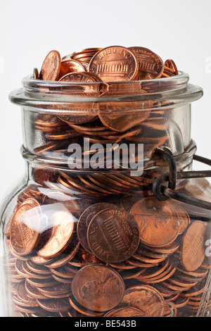 Jar full of pennies Stock Photo - Alamy