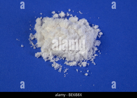 Mephedrone 4-methylmethcathinone (4-MMC) powder with a blue studio ...